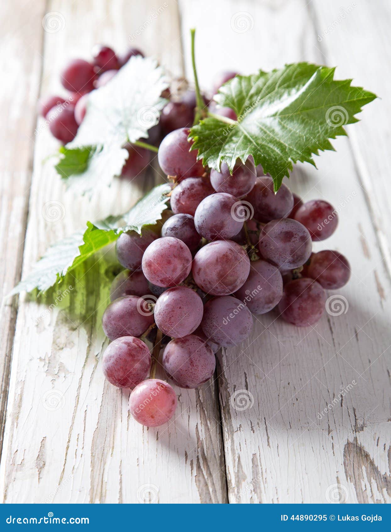 Grapes on wooden table stock image. Image of green, growth - 44890295
