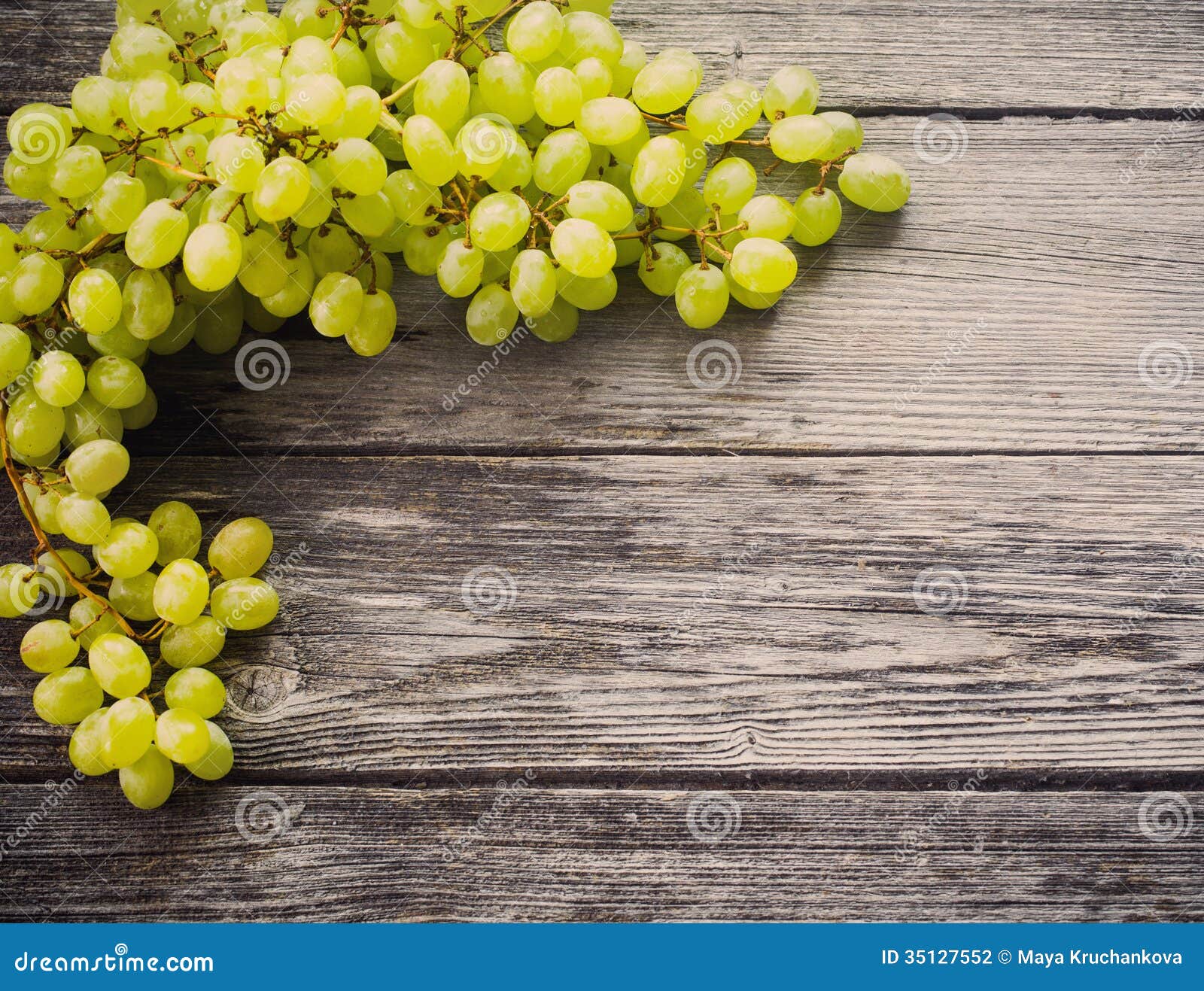 Grapes on a wooden table stock photo. Image of juice - 35127552