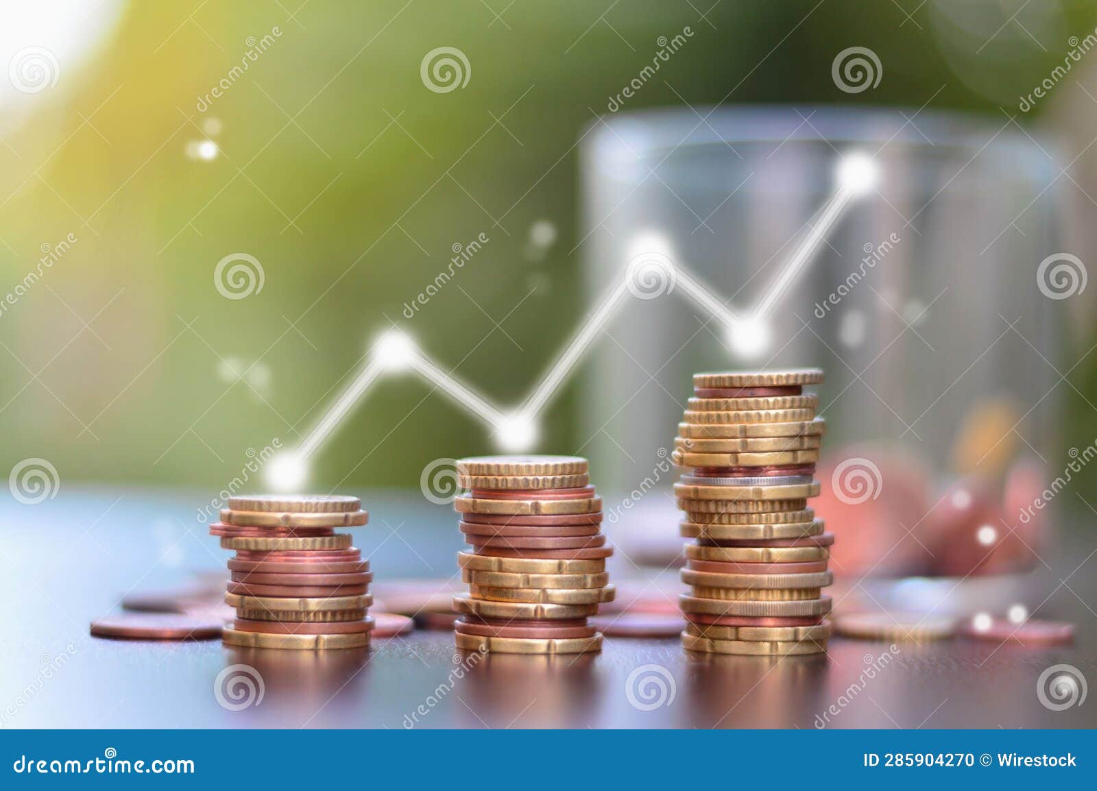 Graph Showing an Upward Trend with a Handful of Coins Scattered in the ...