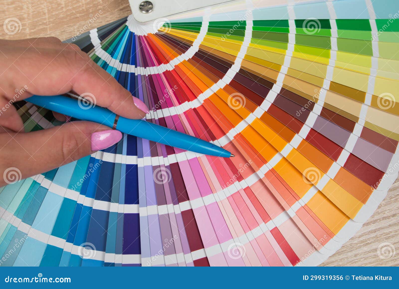 Graphic Designer Choosing Color from Sampler Stock Photo - Image of ...