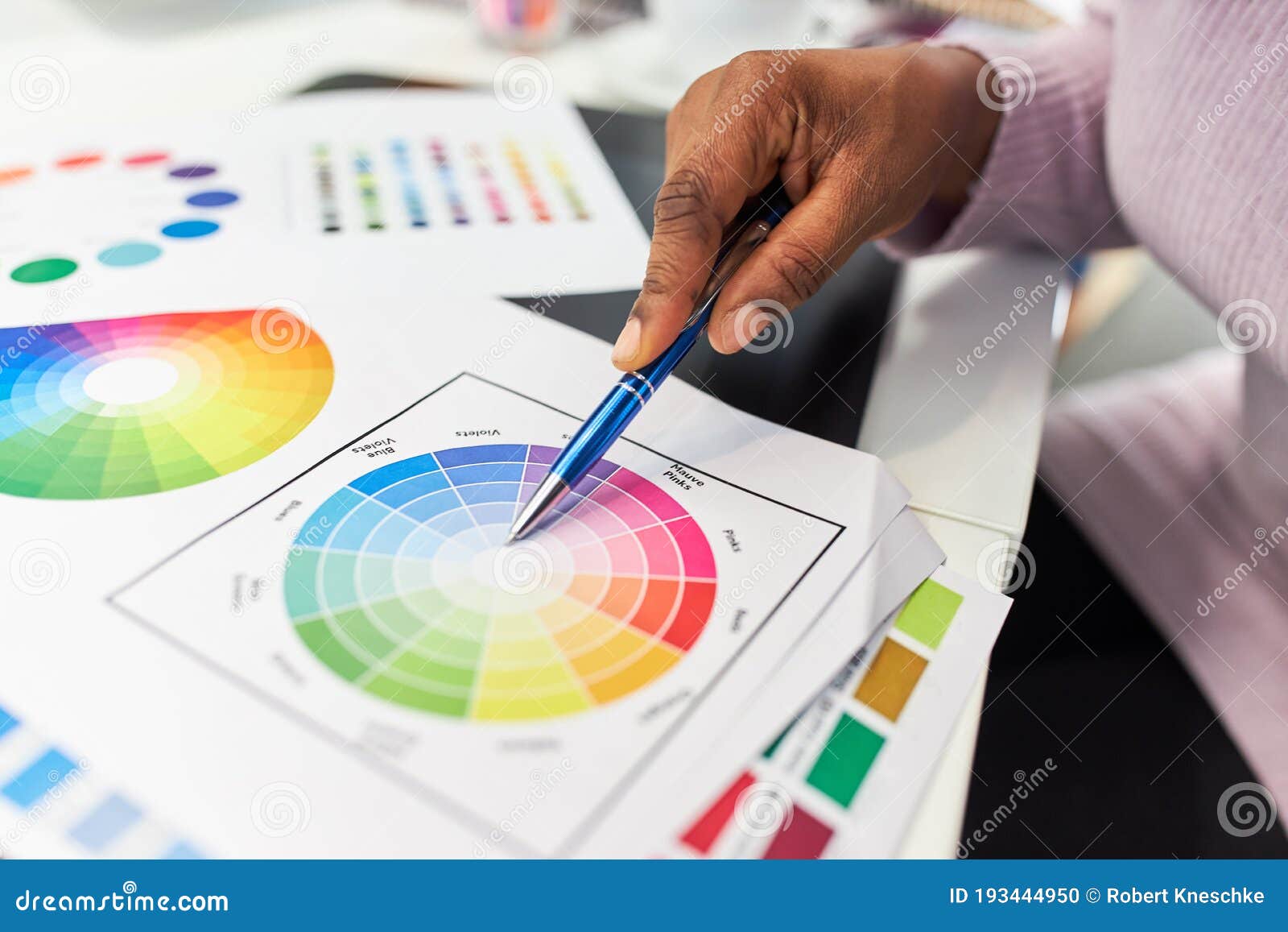 Graphic Designer for Color Design with Color Wheel Stock Photo - Image ...