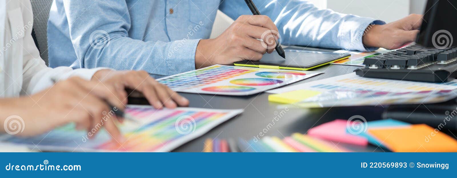 Graphic Designer or Creative Working Together Coloring Using Graphics ...
