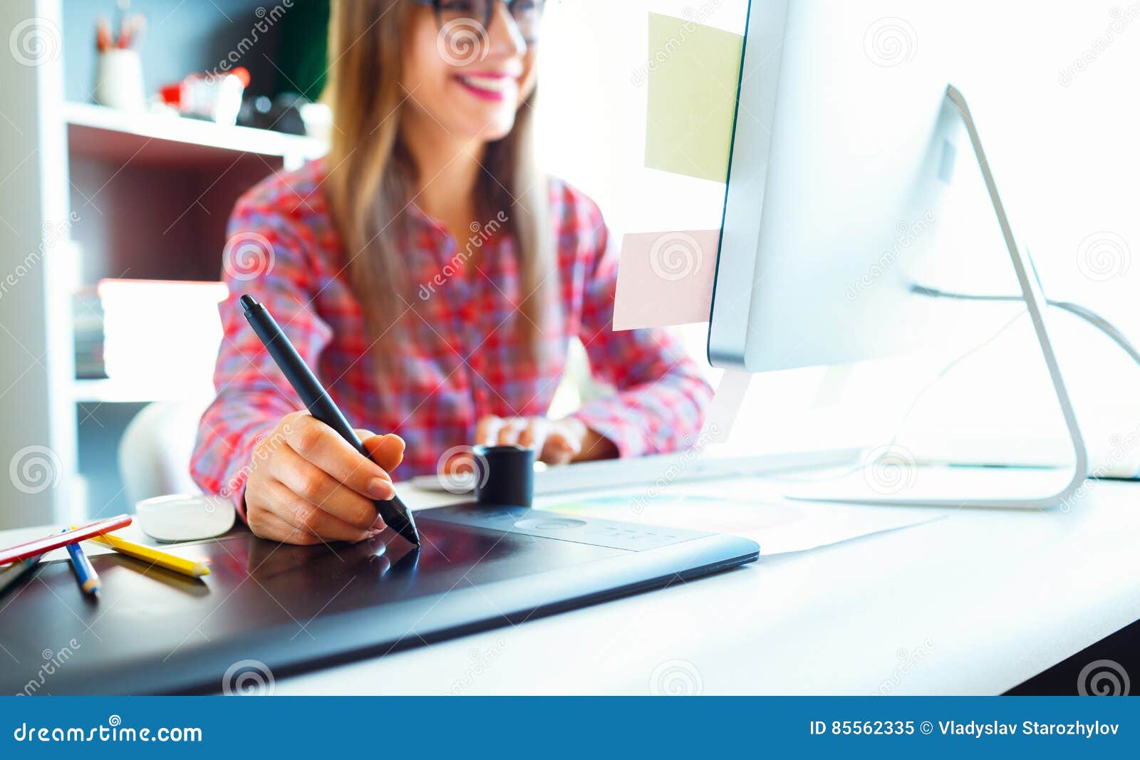 Graphic Designer Drawing Something on Graphic Tablet at the Work Stock ...