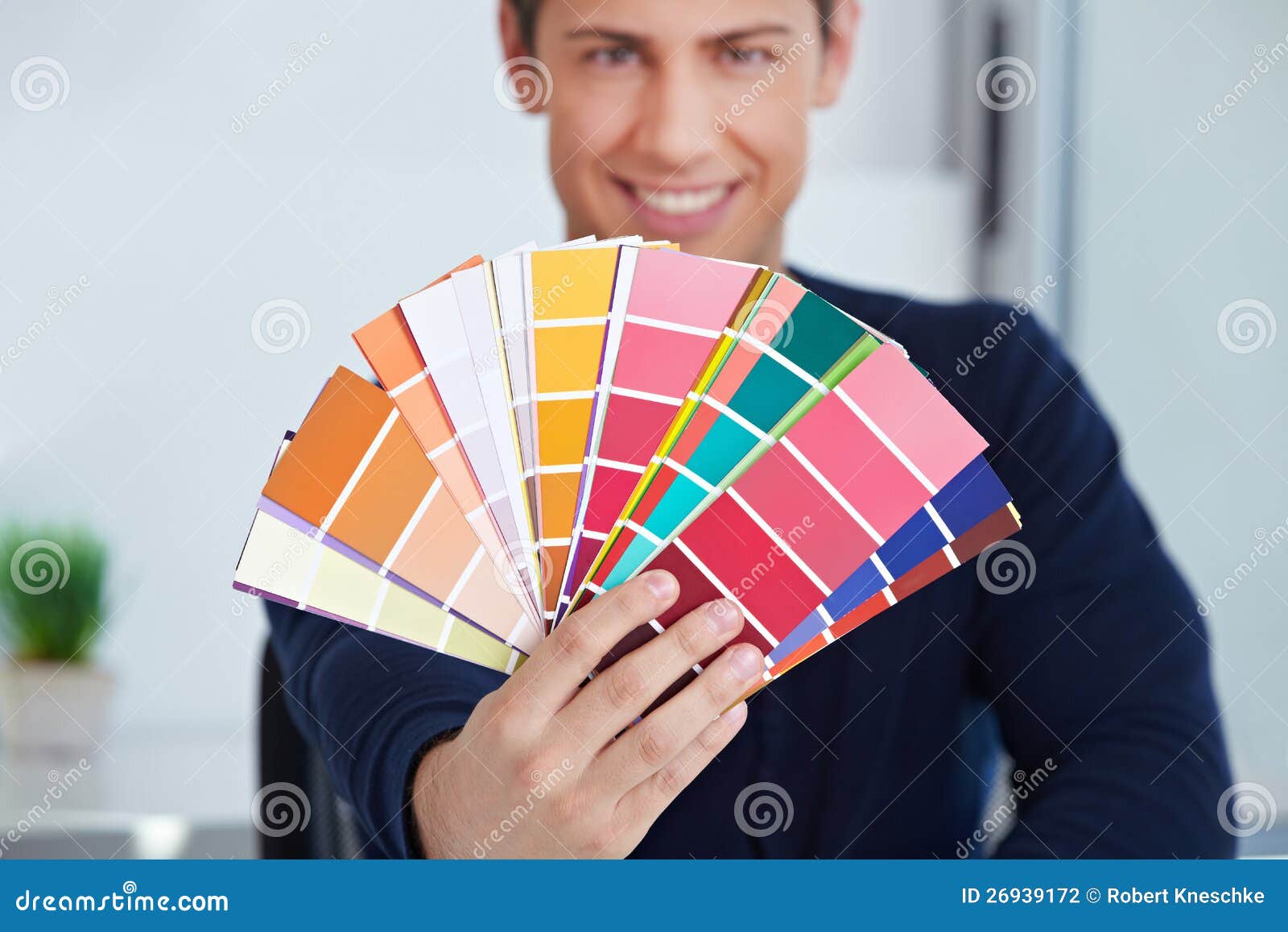Graphic Designer Holding Color Fan Stock Photo - Image of architectural ...