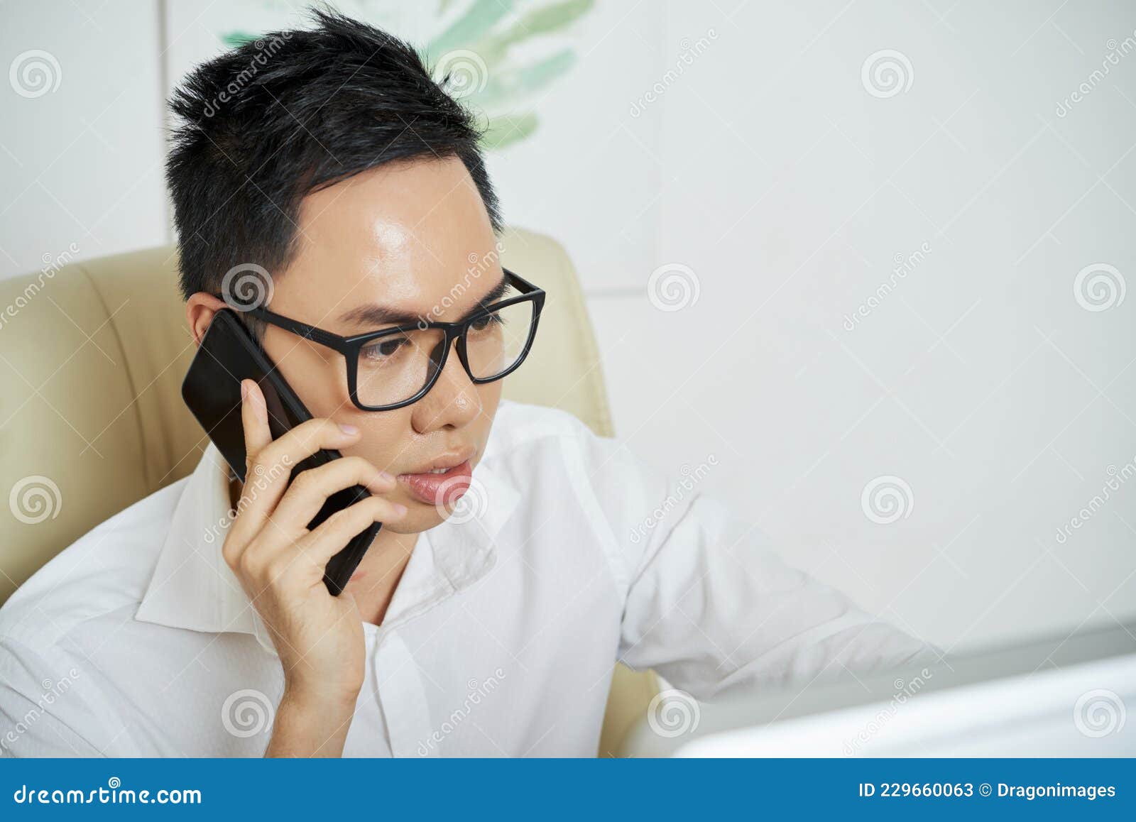 Graphic Designer Making Phone Call Stock Image - Image of office ...