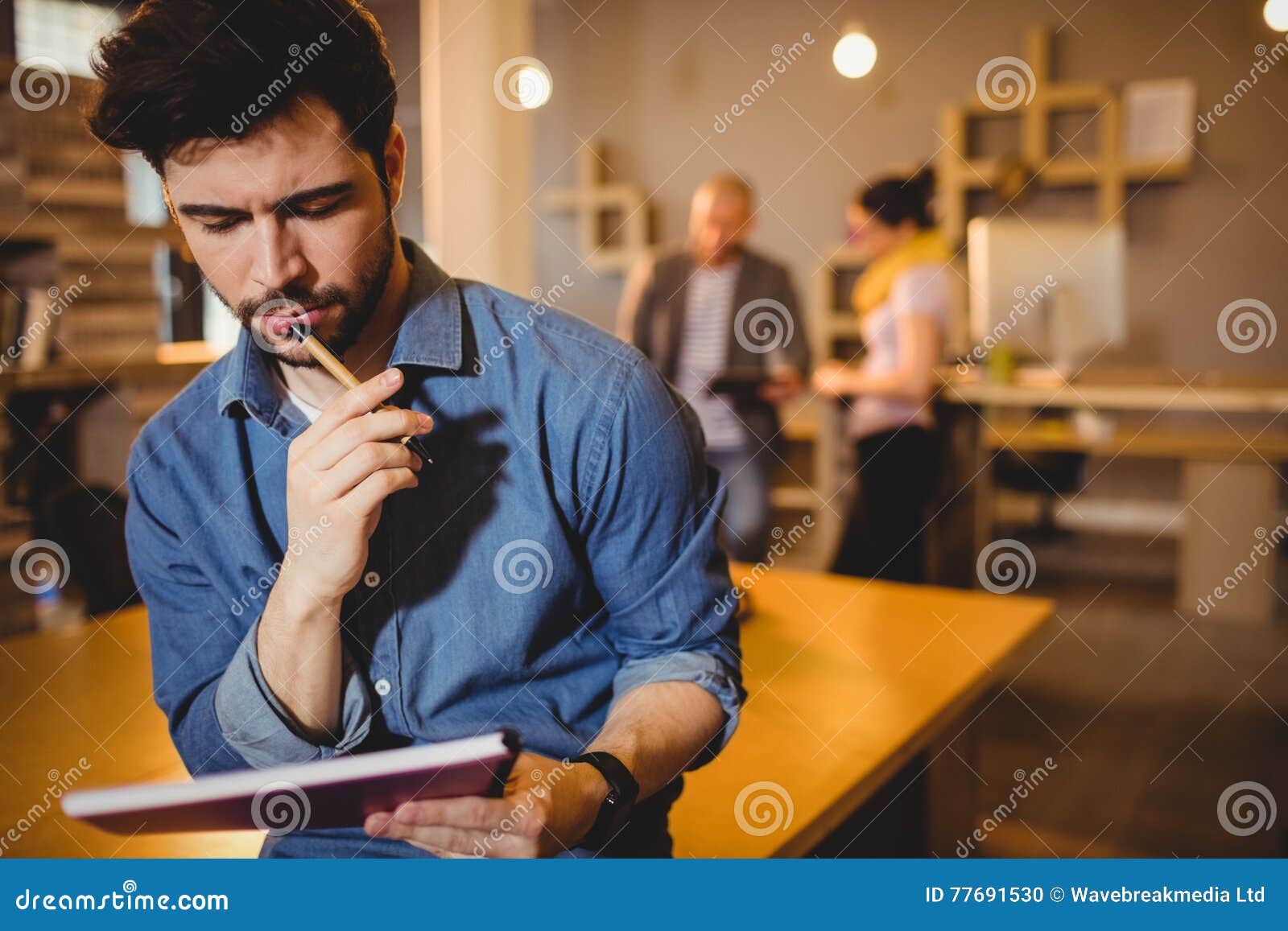 Graphic Designer Reading Notes from His Diary Stock Photo - Image of ...