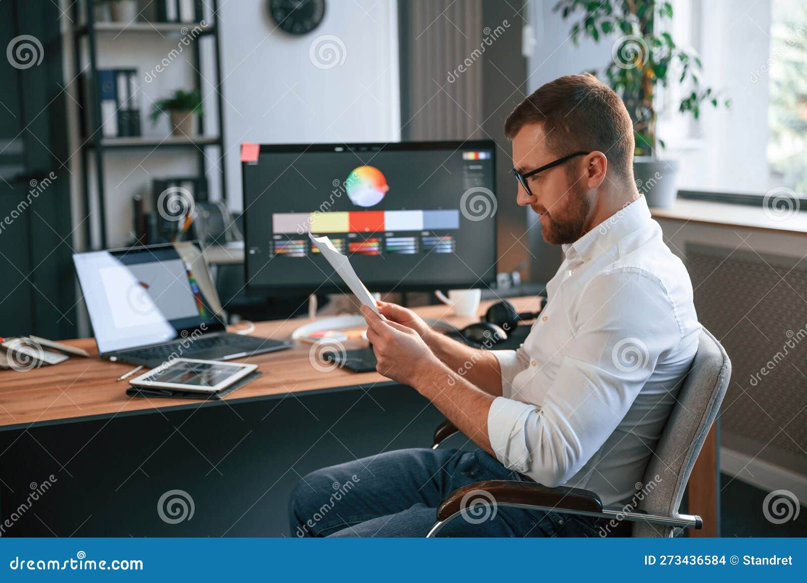 Graphic Designer is Sitting. Man in Formal Clothes is Working in the ...