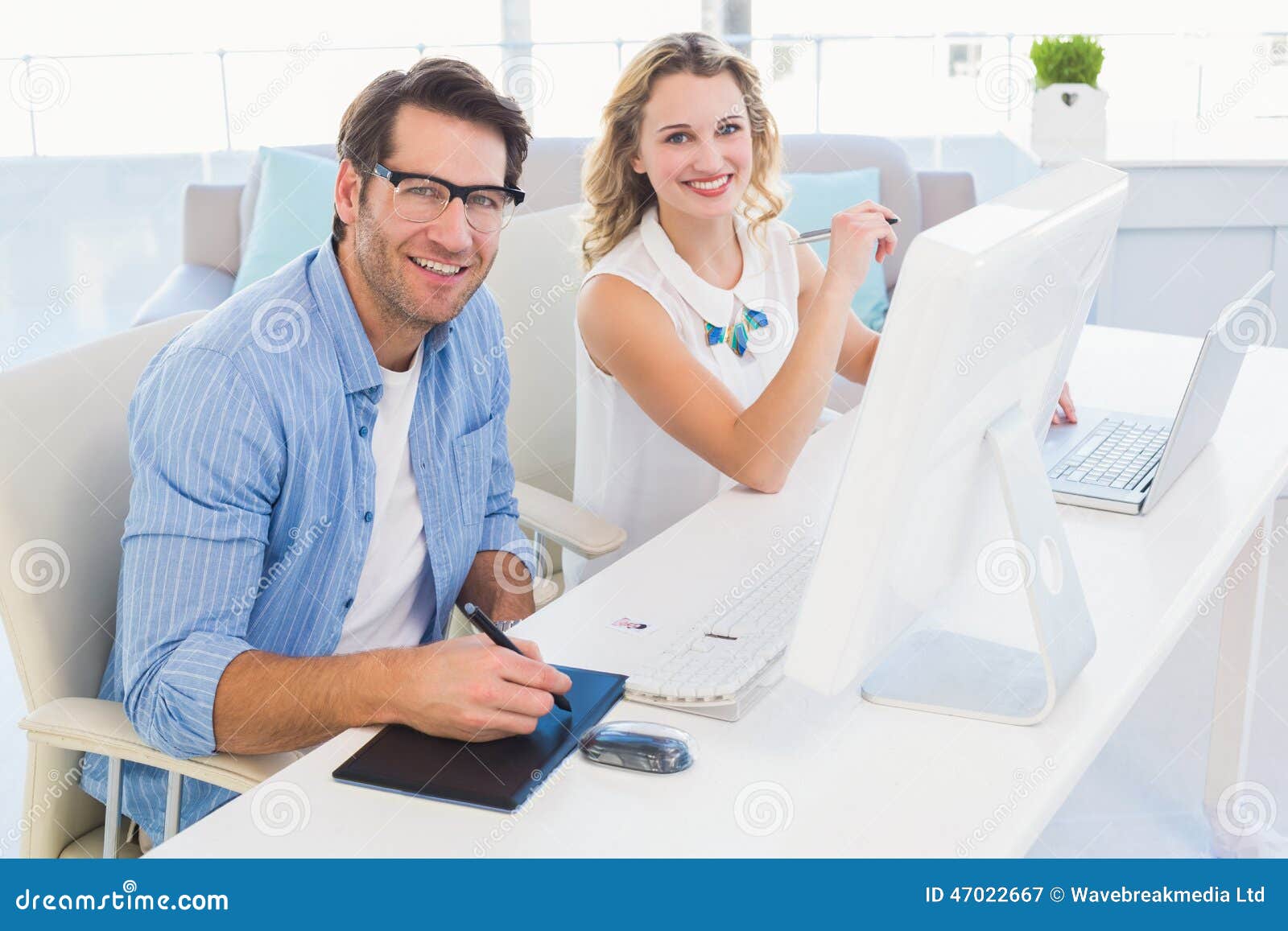 Graphic Designer Using a Graphics Tablet Stock Image - Image of people ...
