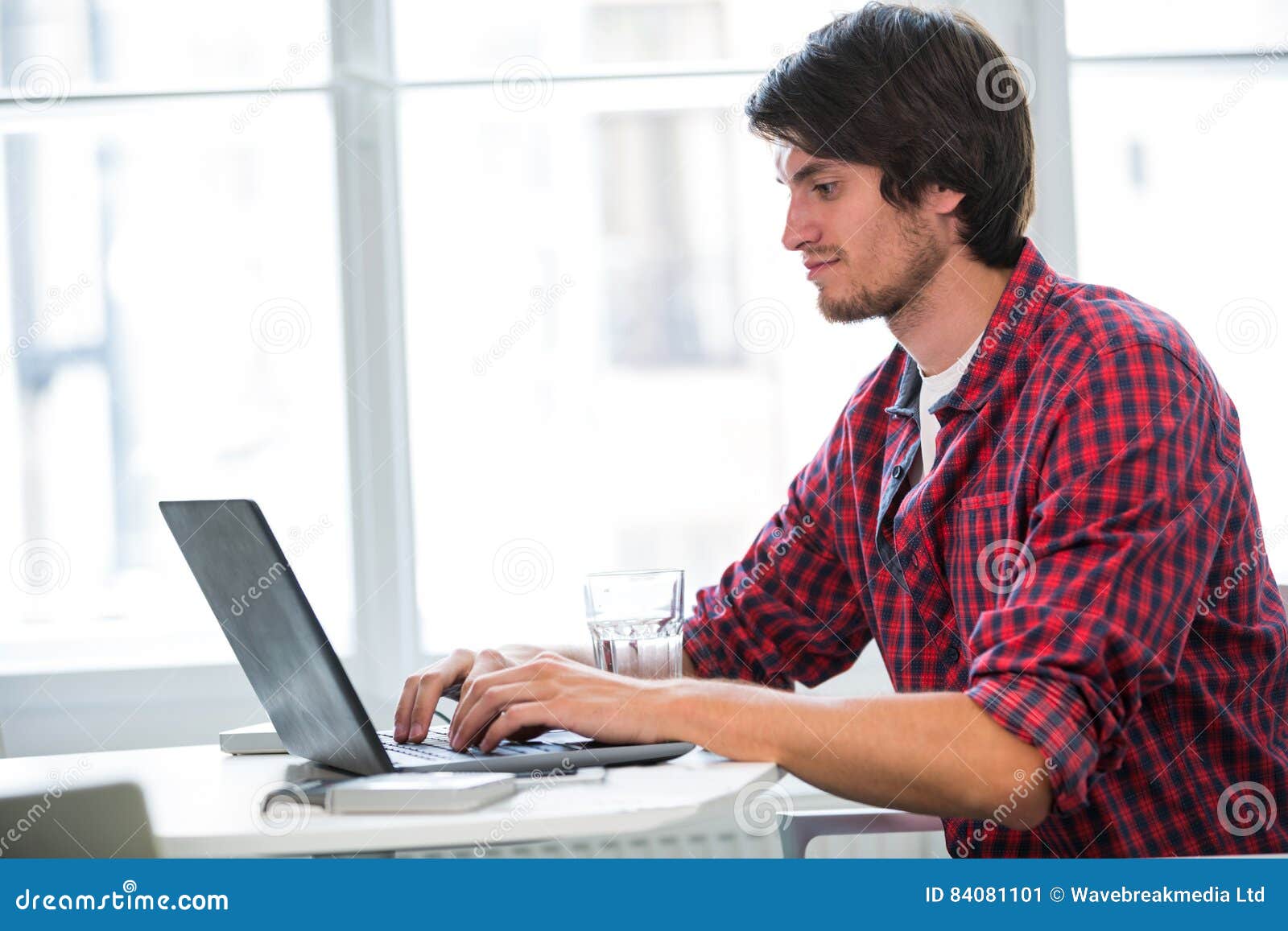 Graphic Designer Using Laptop at His Desk Stock Image - Image of people ...