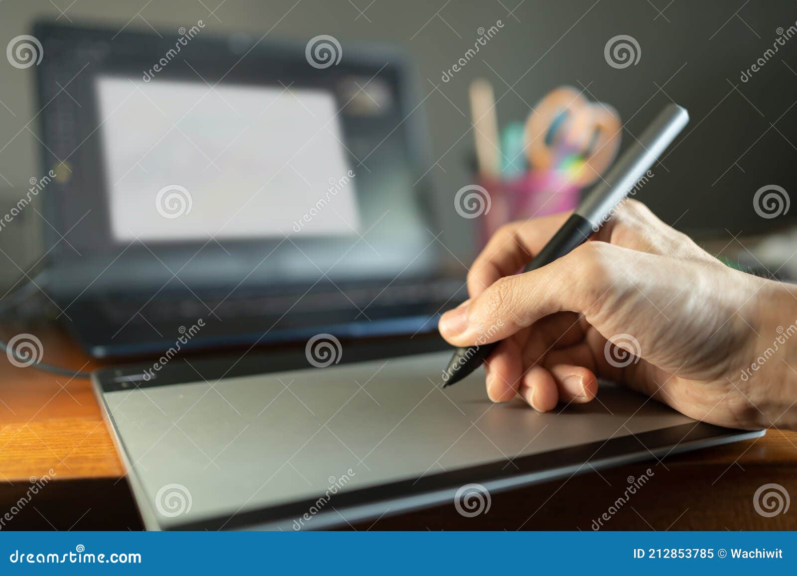 Graphic Designer Using Pen Tablet To Create Digital Artwork Stock Image ...