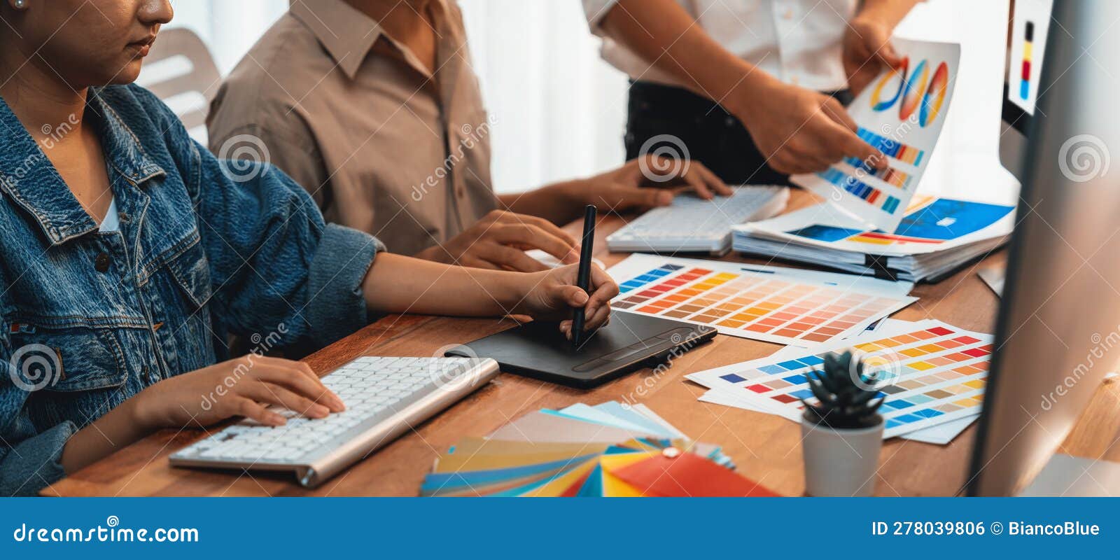 Graphic Designer Works on Computer Laptop with Digital Pen. Scrutinize ...