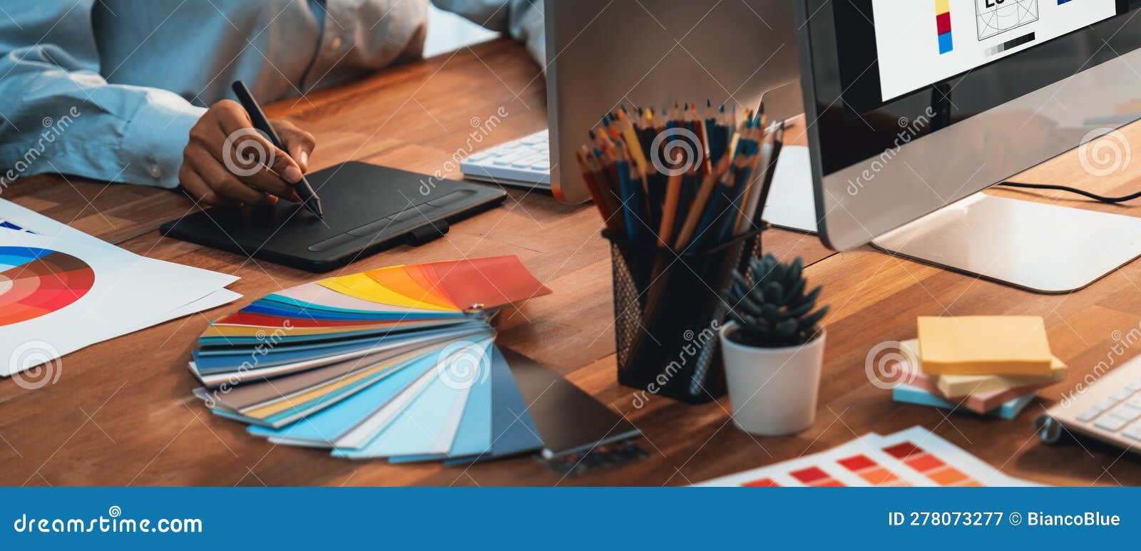 Graphic Designer Works on Computer Laptop with Digital Pen. Scrutinize ...