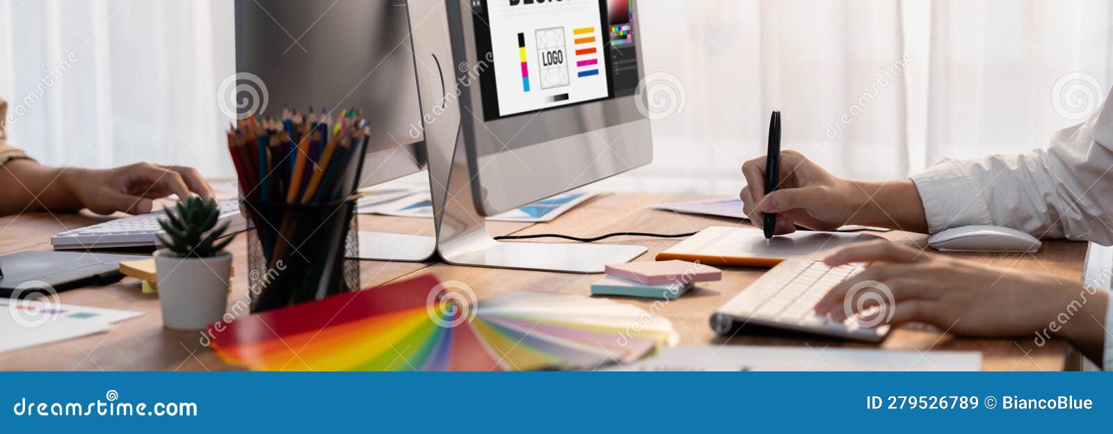 Graphic Designer Works on Computer Laptop with Digital Pen. Scrutinize ...