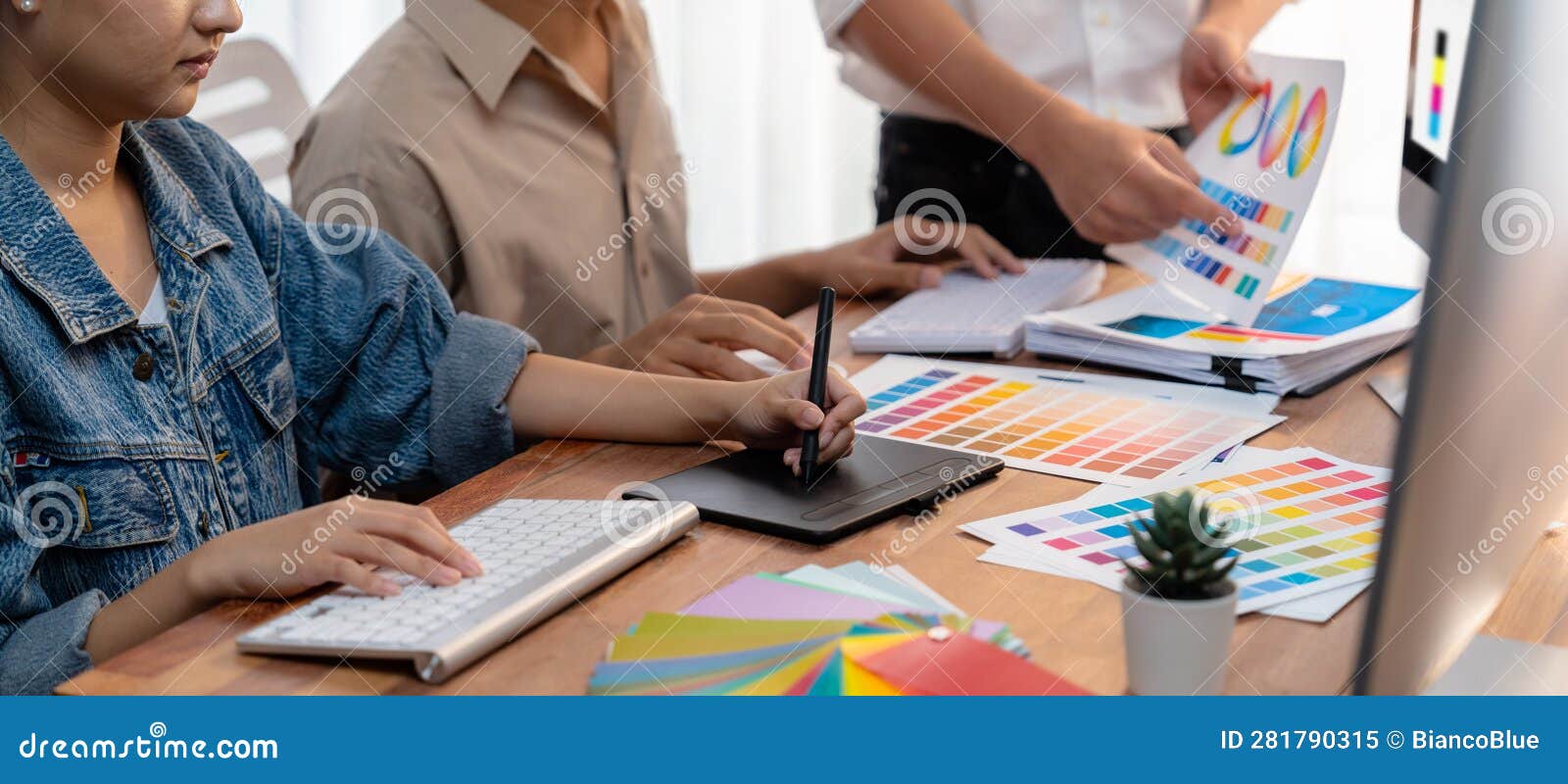 Graphic Designer Works on Computer Laptop with Digital Pen. Scrutinize ...