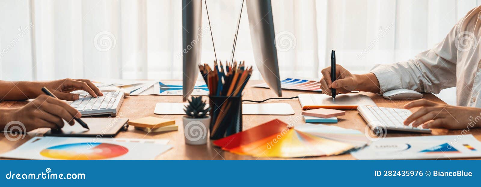Graphic Designer Works on Computer Laptop with Digital Pen. Scrutinize ...