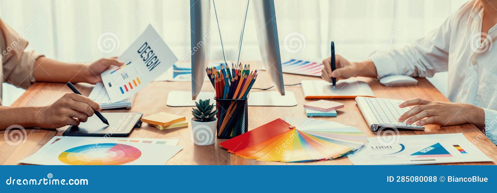 Graphic Designer Works on Computer Laptop with Digital Pen. Scrutinize ...