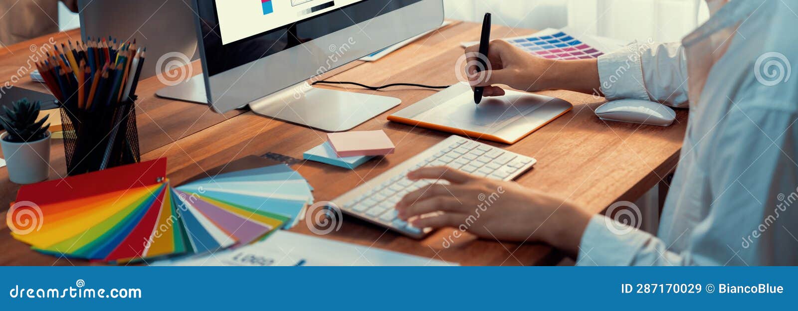 Graphic Designer Works on Computer Laptop with Digital Pen. Scrutinize ...
