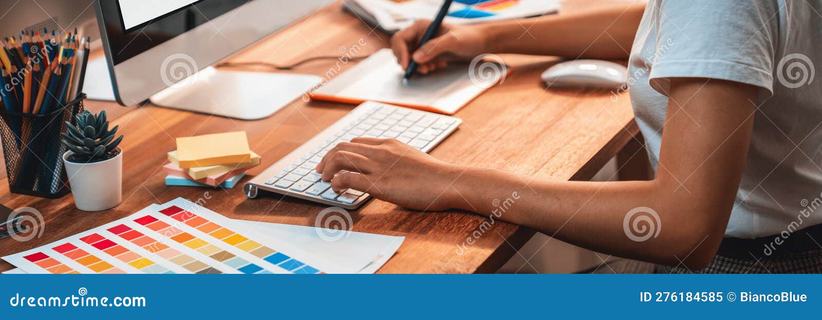 Graphic Designer Works on Computer Laptop with Digital Pen. Scrutinize ...