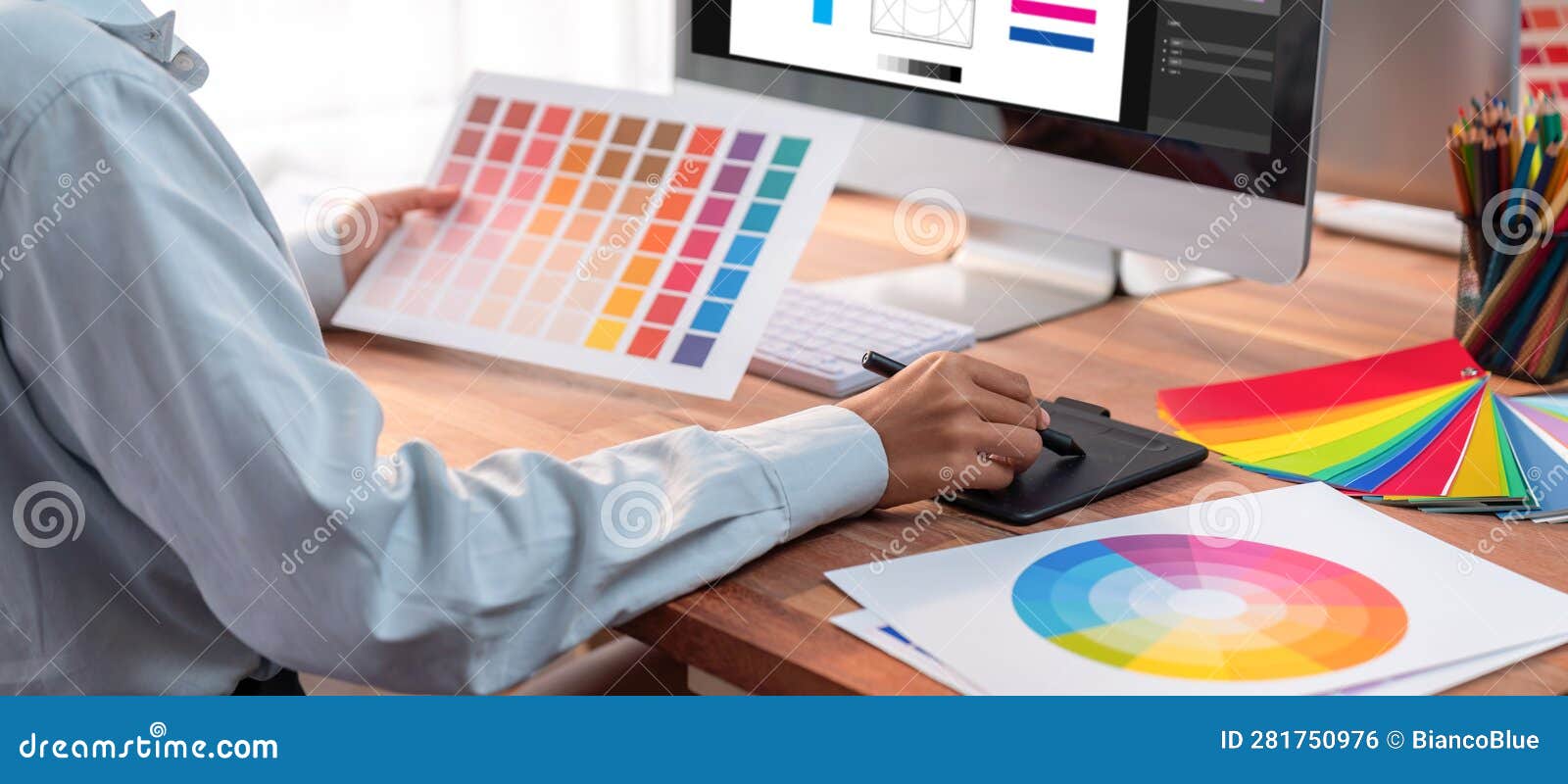 Graphic Designer Works on Computer Laptop with Digital Pen. Scrutinize ...