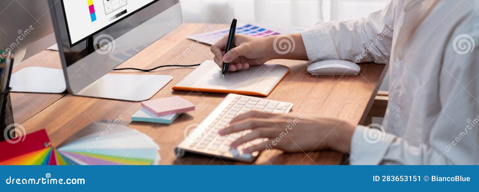 Graphic Designer Works on Computer Laptop with Digital Pen. Scrutinize ...