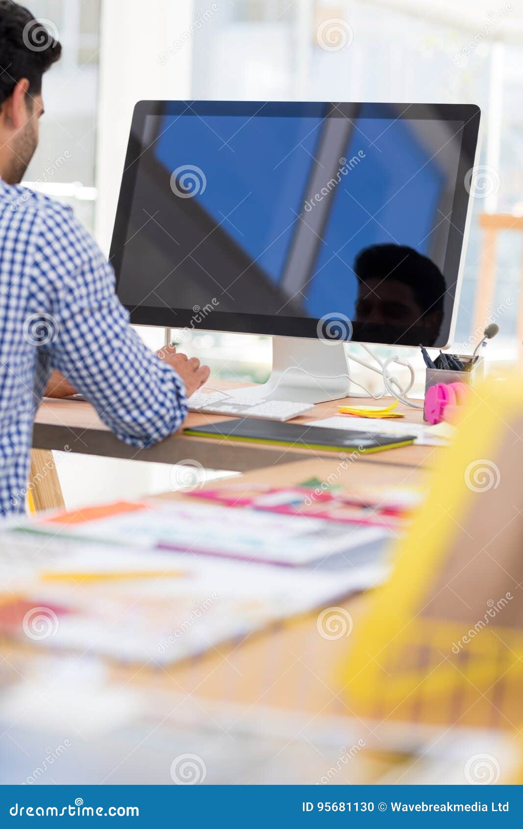 Graphic Designer Working on Computer at Desk Stock Photo - Image of ...