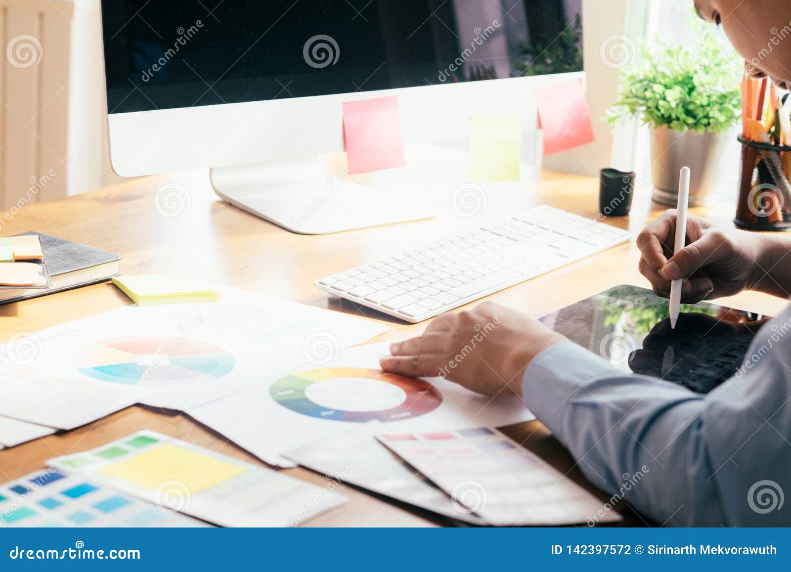 Graphic Designer Working on Computer and Used Graphics Tablet Stock ...