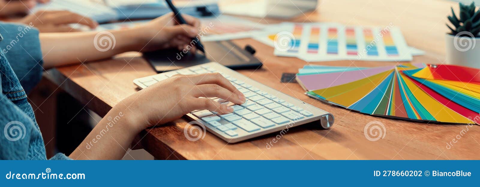 Graphic Designer Works on Computer Laptop with Digital Pen. Scrutinize ...