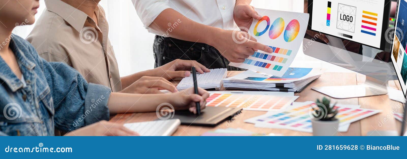 Graphic Designer Works on Computer Laptop with Digital Pen. Scrutinize ...