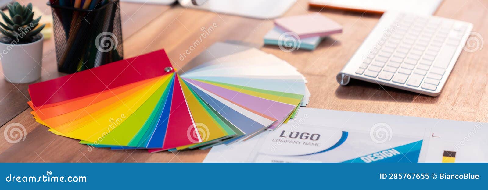 Graphic Designer S Workspace Features Color Palette and Laptop ...