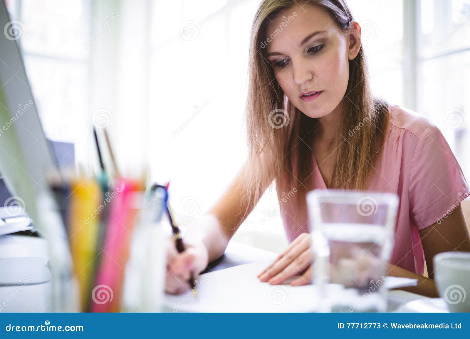 Graphic Designer Writing Document at Desk Stock Image - Image of ...