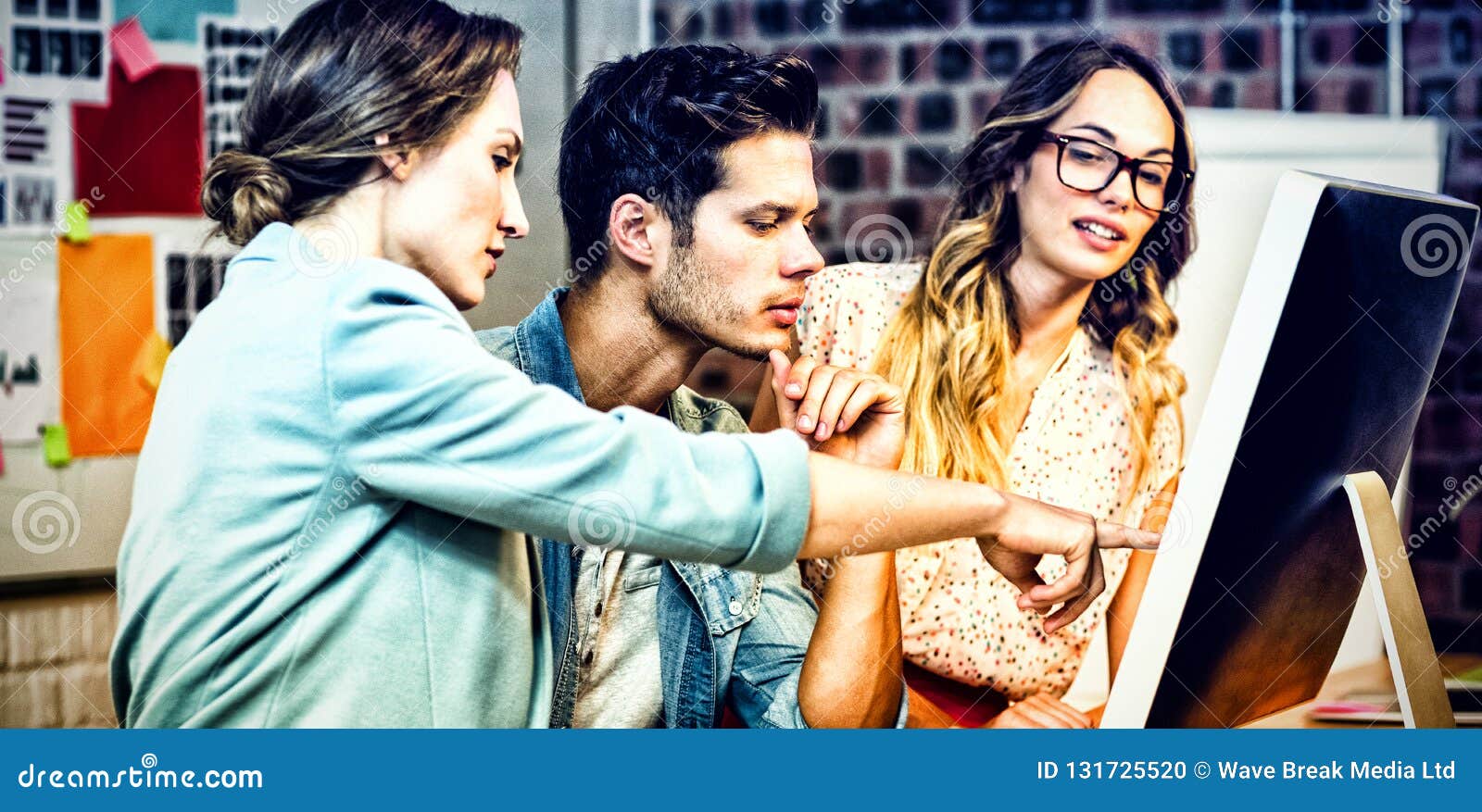 Graphic Designers Discussing Over Computer Stock Photo - Image of ...