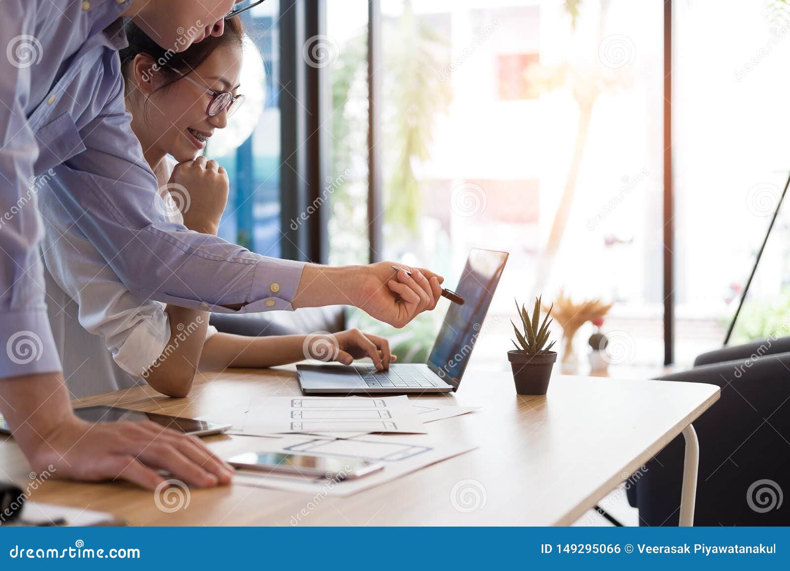 Graphic Designers Work Together with Computer Designing Application for ...