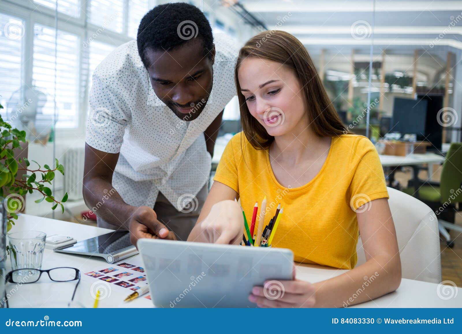 Graphic Designers Working Over Digital Table at Desk Stock Photo ...