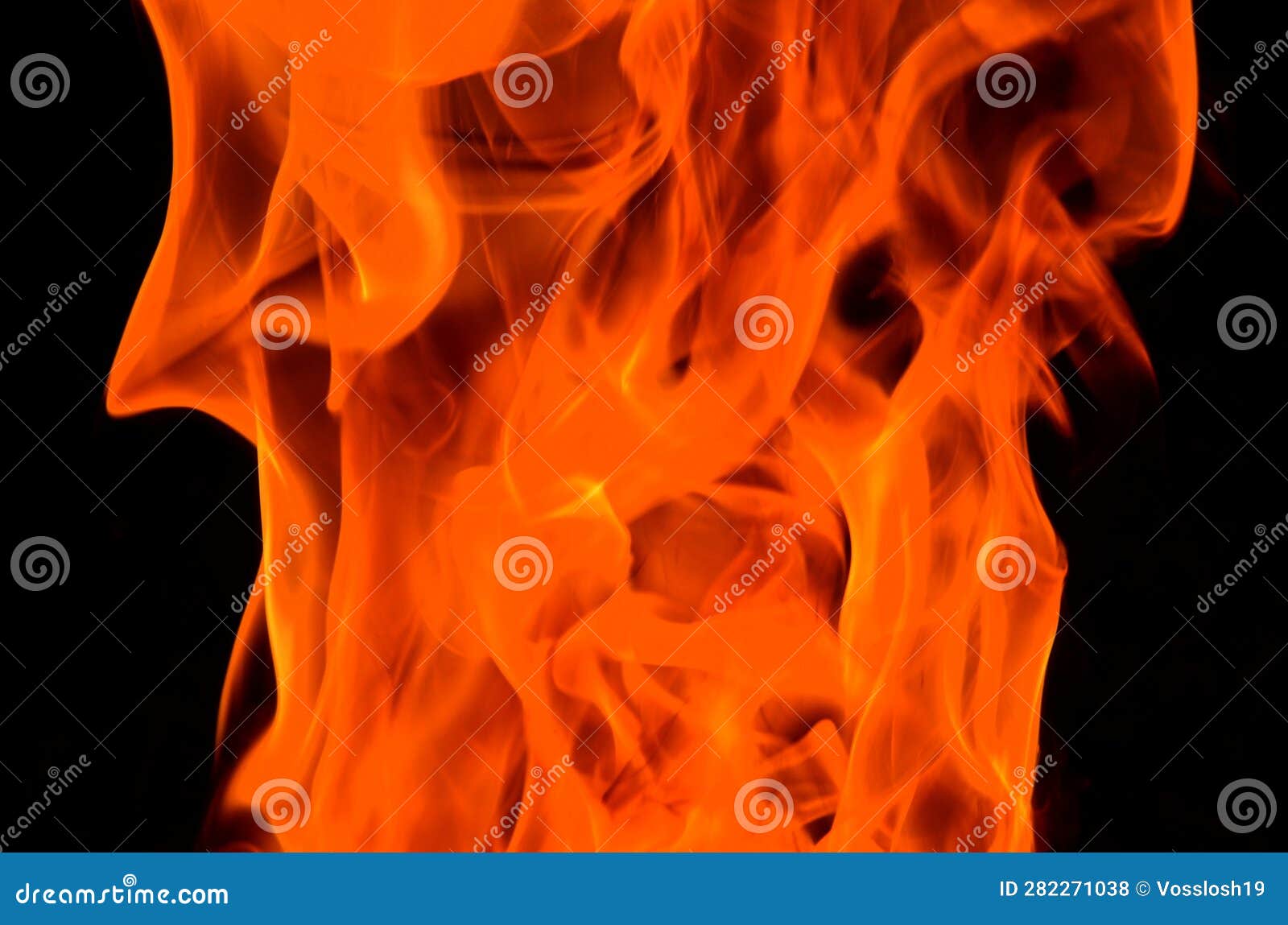 Bright Orange Flame on a Dark Background. Stock Photo - Image of ...