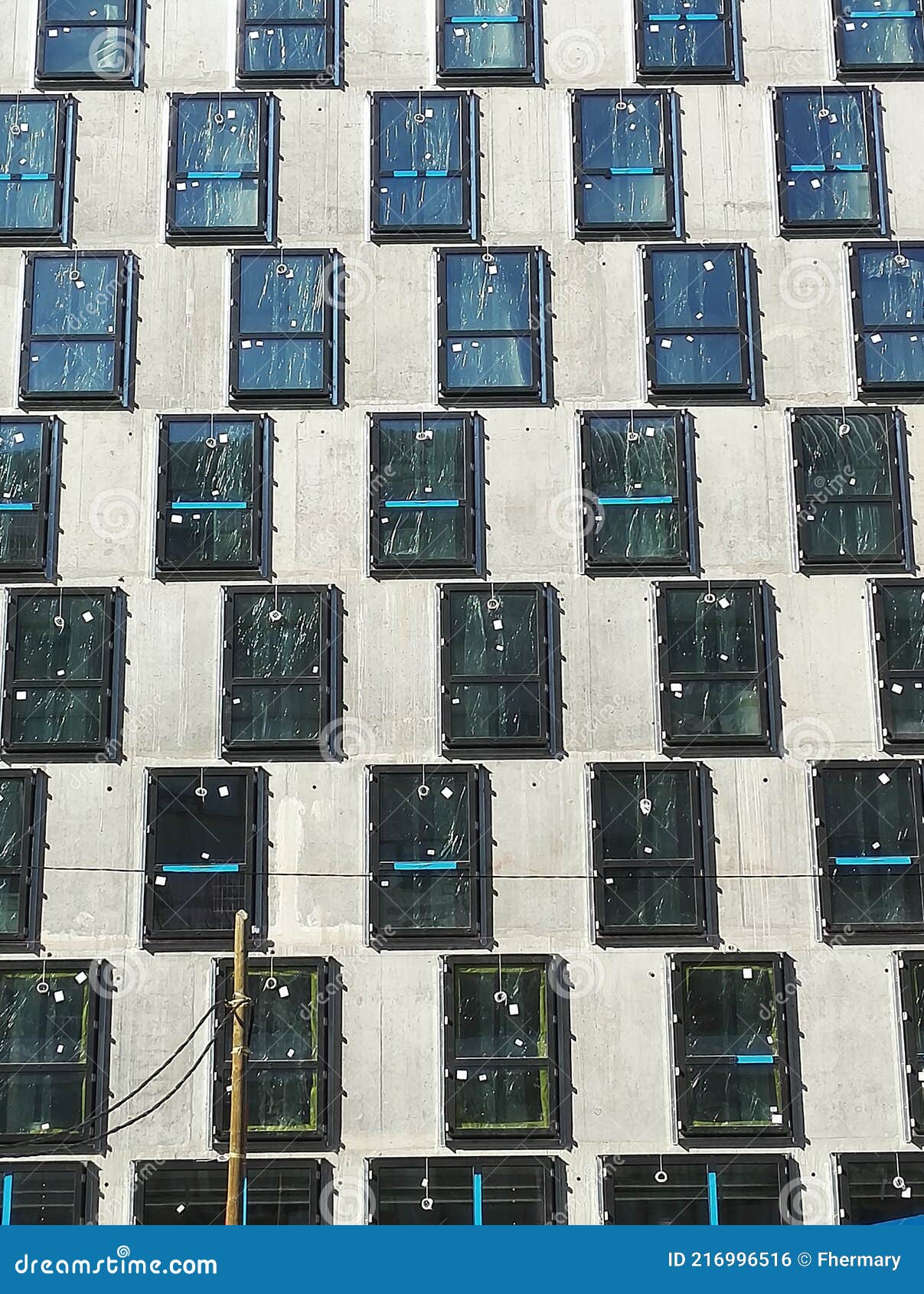 Alignment Of Windows And Mineral Wool Insulation On A Building Under ...