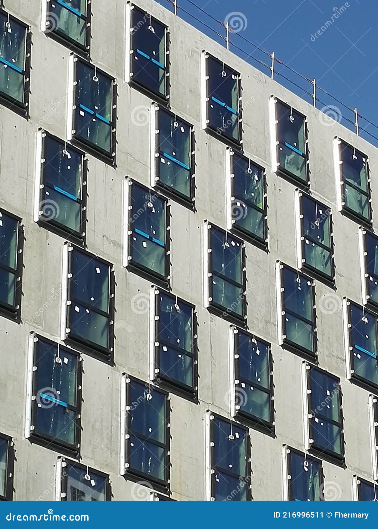 Alignment Of Windows And Mineral Wool Insulation On A Building Under ...