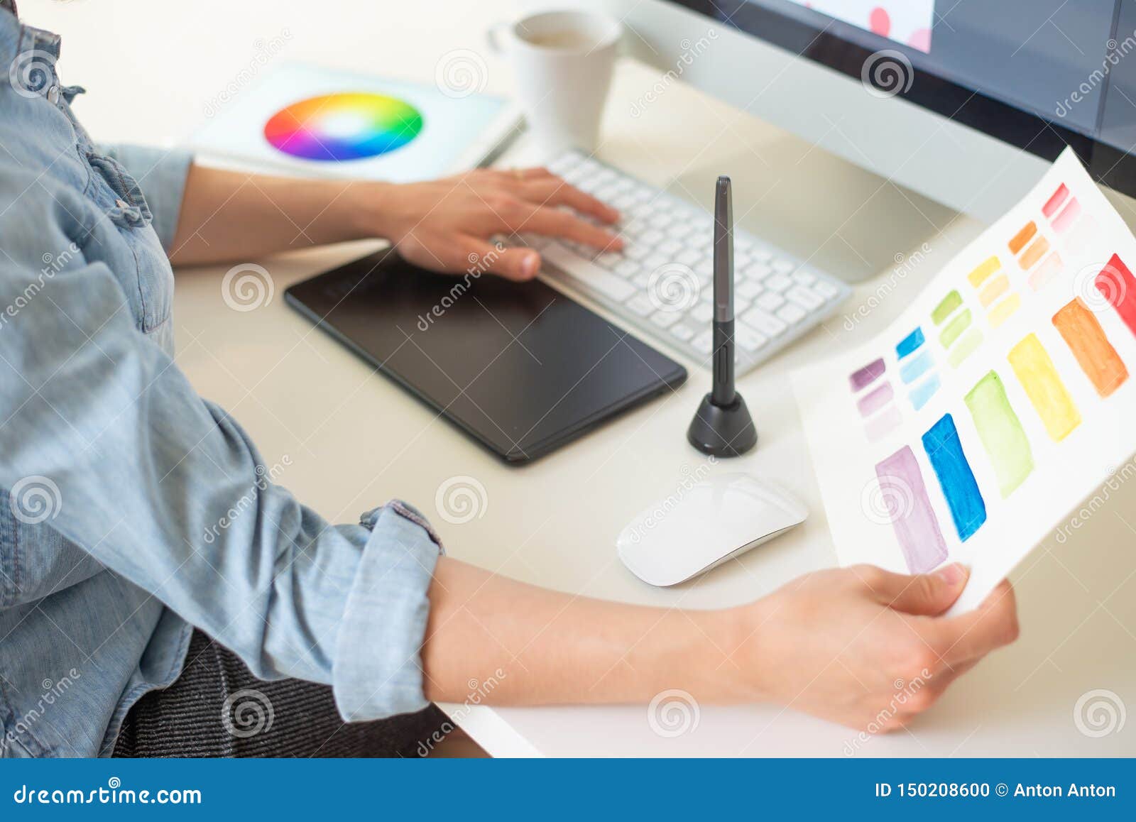 Graphic Web Designer Does the Work Using a Graphics Tablet, Desktop ...