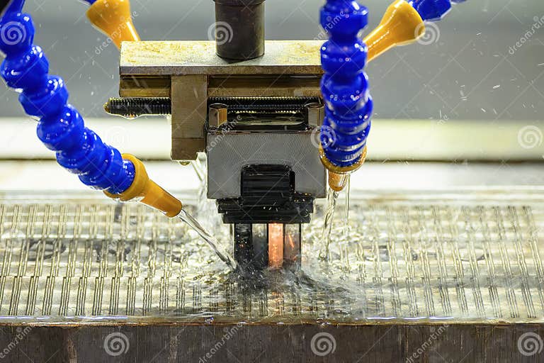 The Graphite Electrode Working on EDM Machine with Liquid Coolant ...