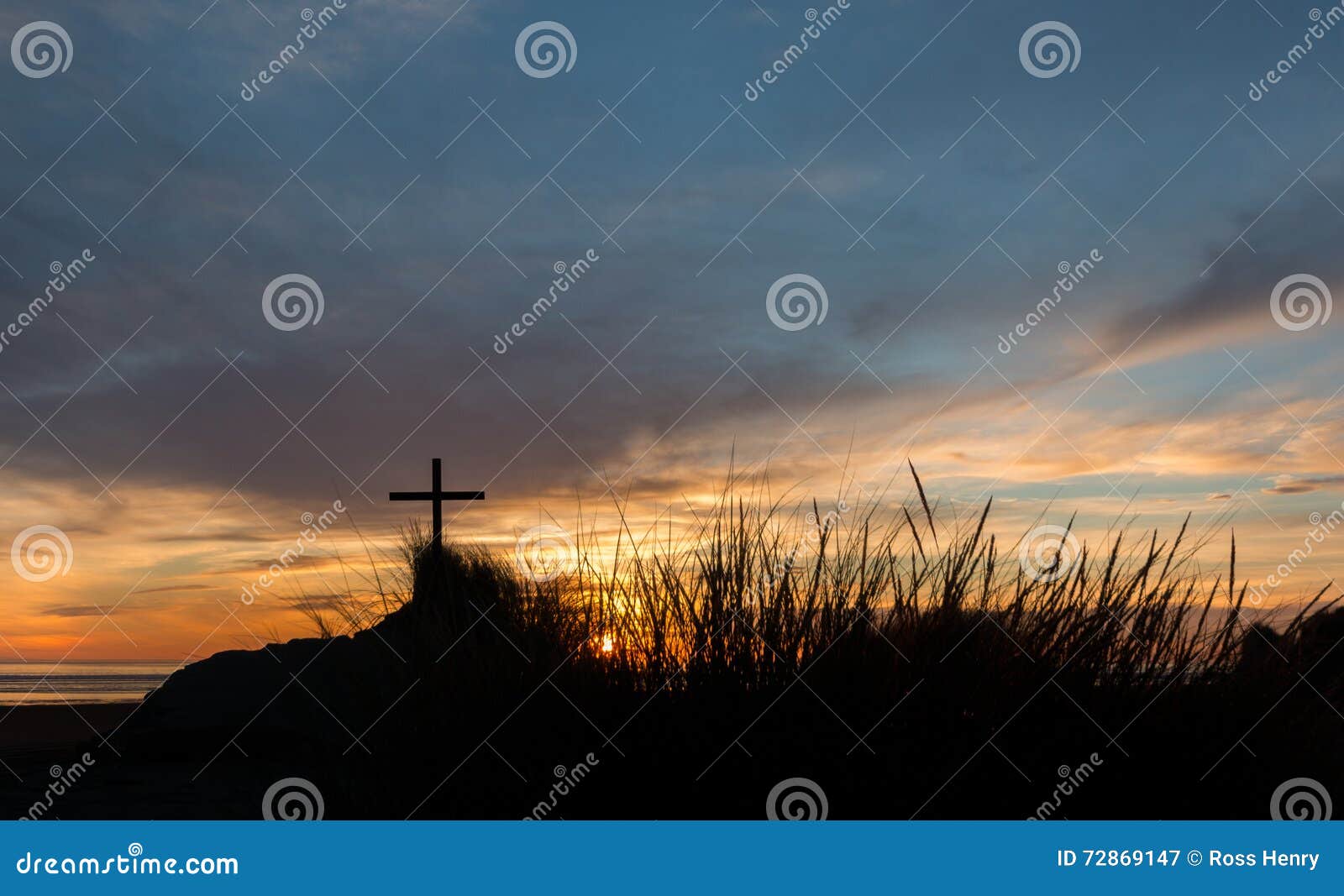 Grass Croos Sunset stock image. Image of sundown, beach - 72869147