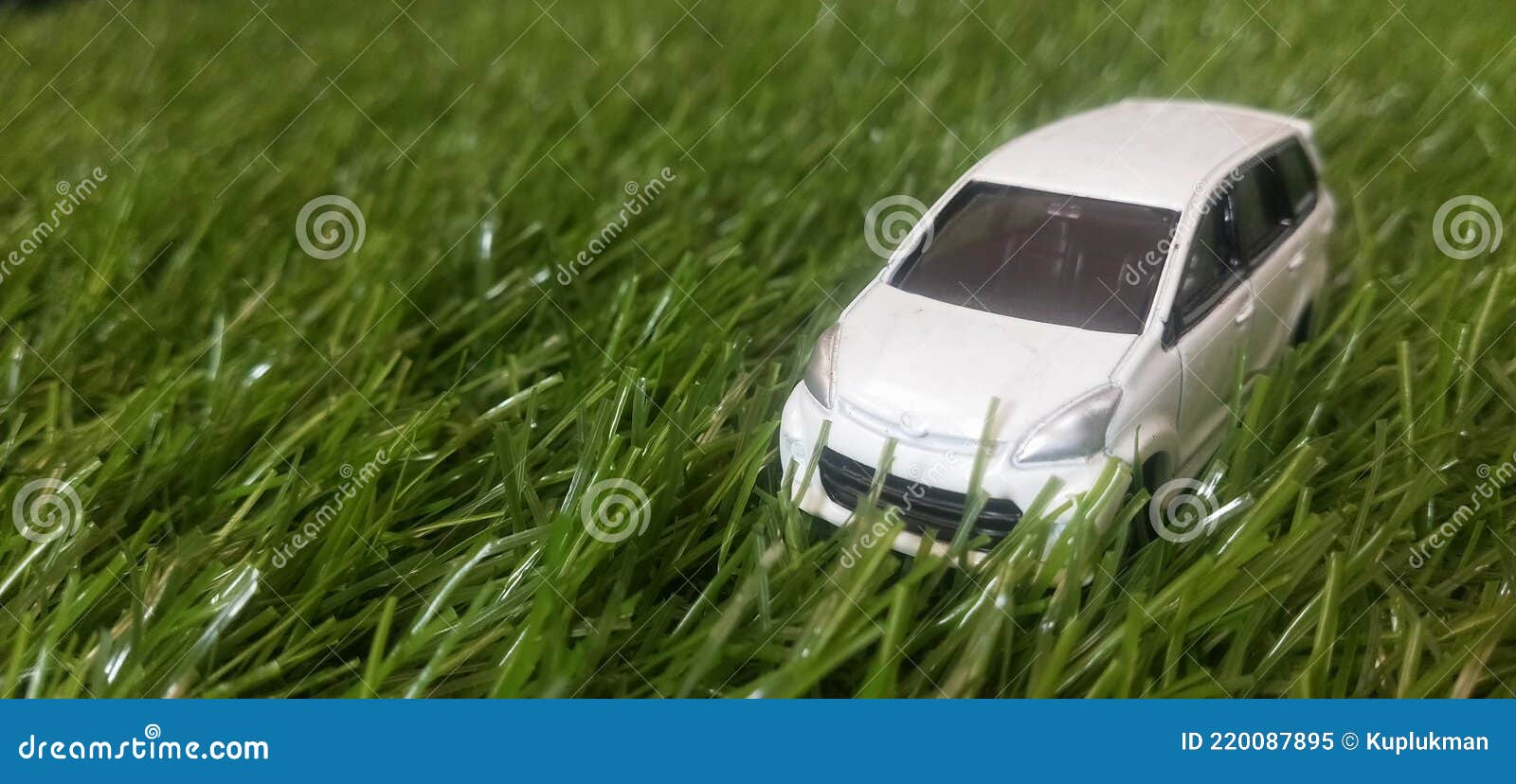 Grass and Miniature White Car Stock Image - Image of grass, white ...
