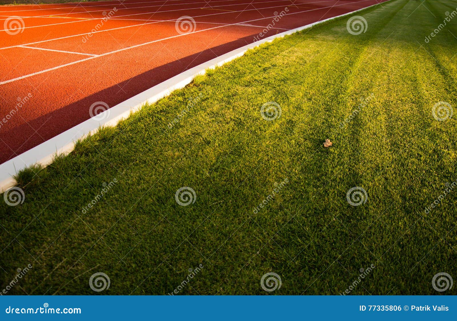 Grass with Running Track and Sunset. Stock Photo - Image of event ...