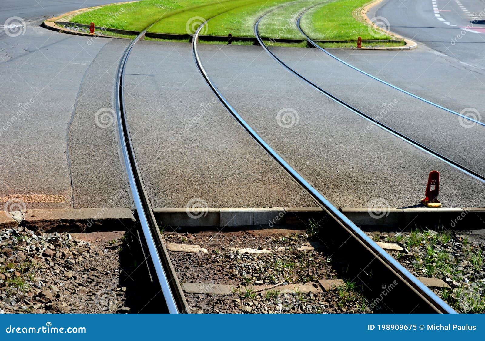 Grassing of Train Tracks between Tram Tracks in the City. Part of it is ...