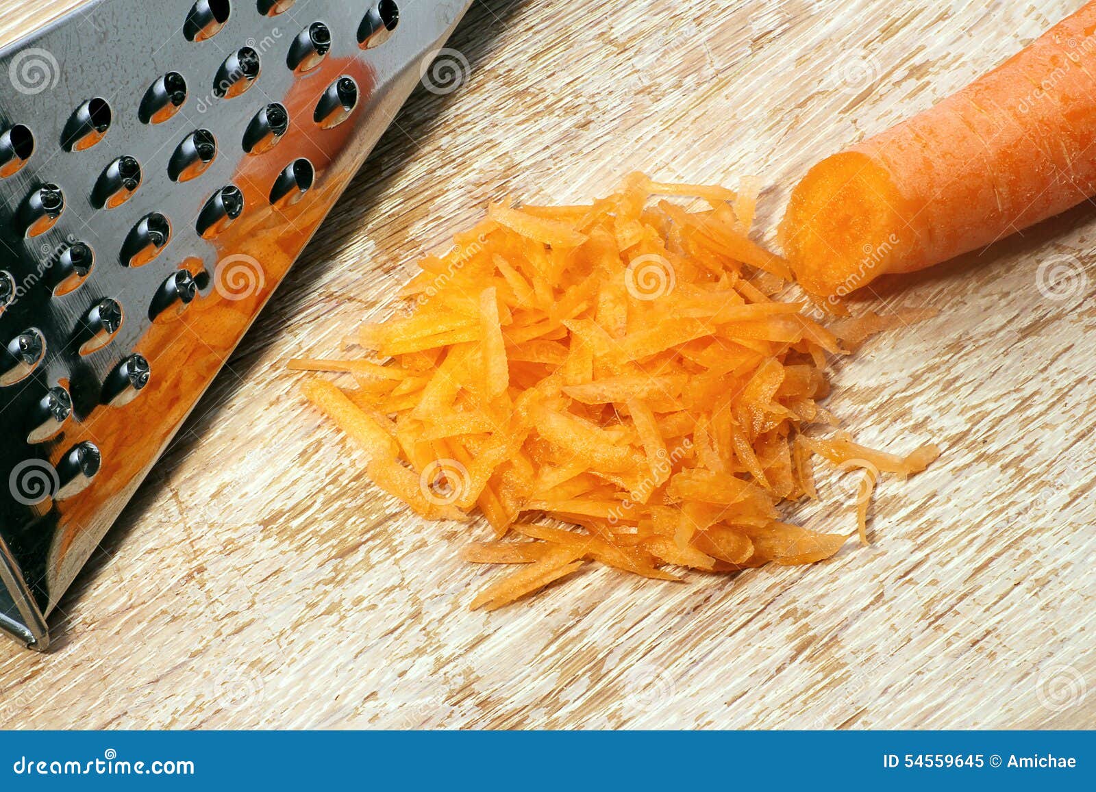 Grated carrot with grater stock image. Image of grater - 54559645