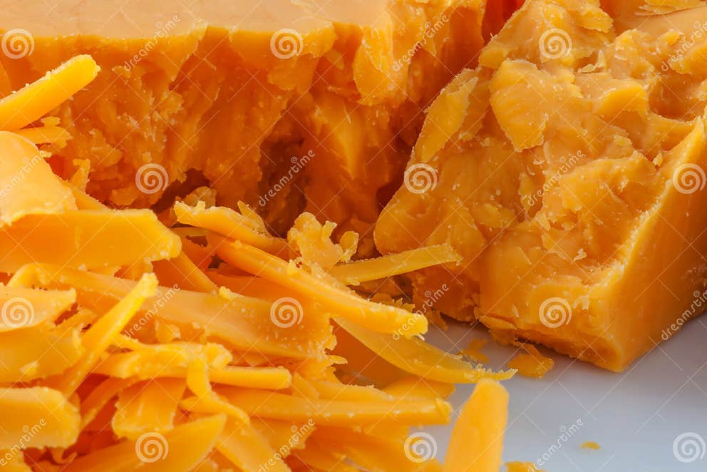 Chunks Abd Grated Hard Aged Cheddar Cheese. Stock Photo - Image of ...