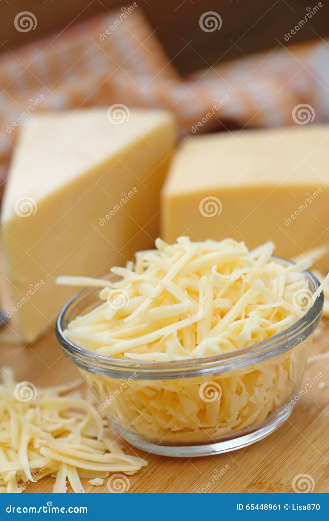 Grated cheese in a bowl stock image. Image of rustic - 65448961