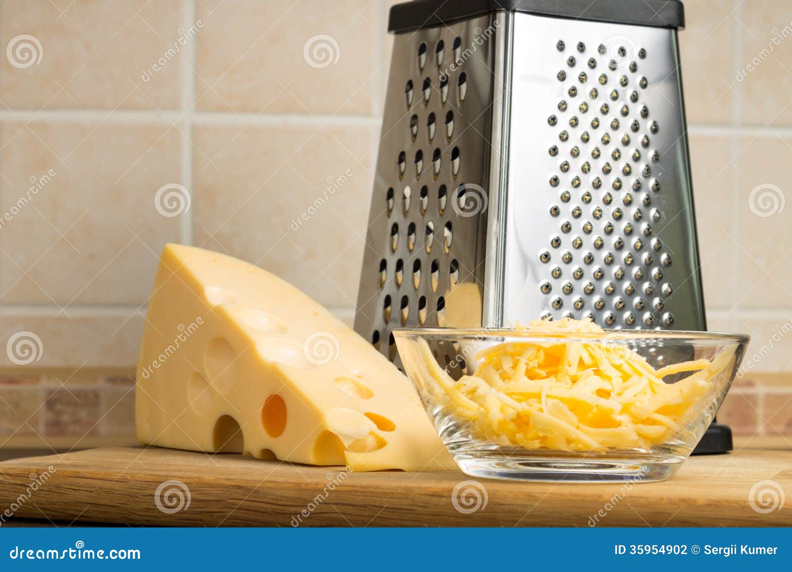 Grated Cheese with Grater stock photo. Image of grated - 35954902