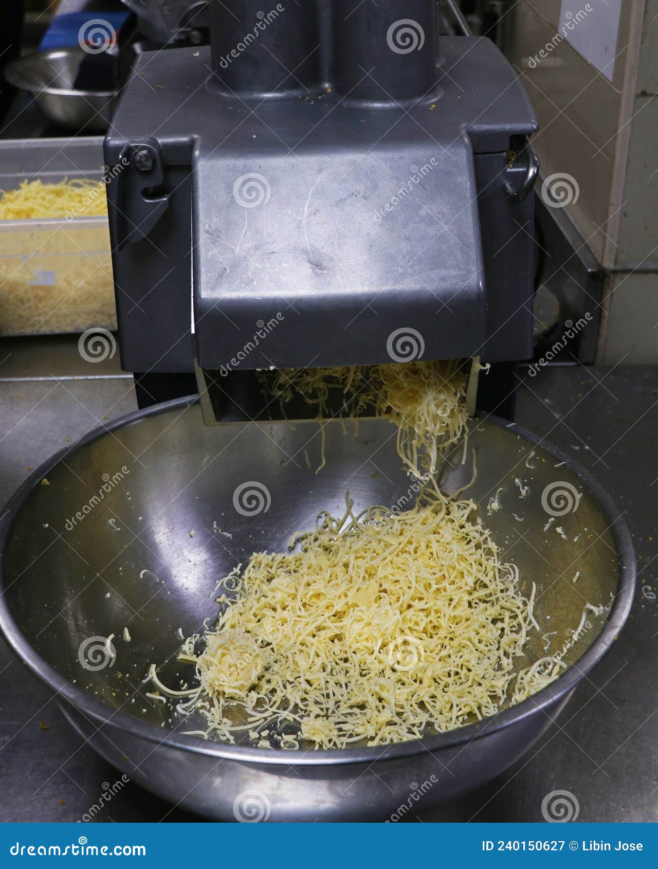Grated Cheese Making with Electric Grater Machine Stock Image - Image ...