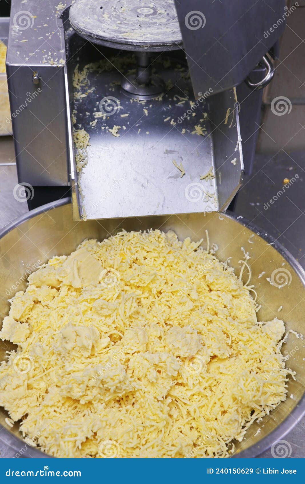 Grated Cheese Making with Electric Grater Machine Stock Image - Image ...