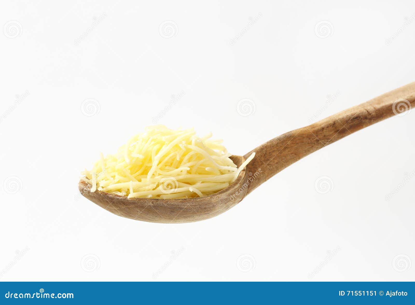 Grated cheese on spoon stock image. Image of product - 71551151