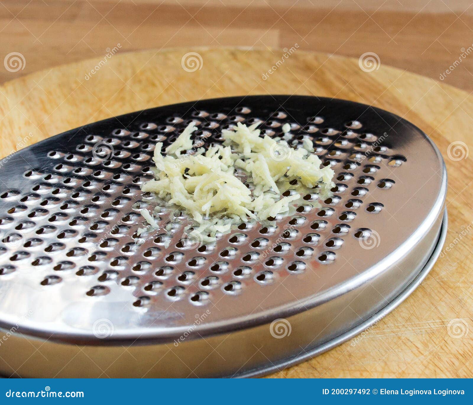 Grated Garlic. Metal Kitchen Tool Stock Photo - Image of chopped ...